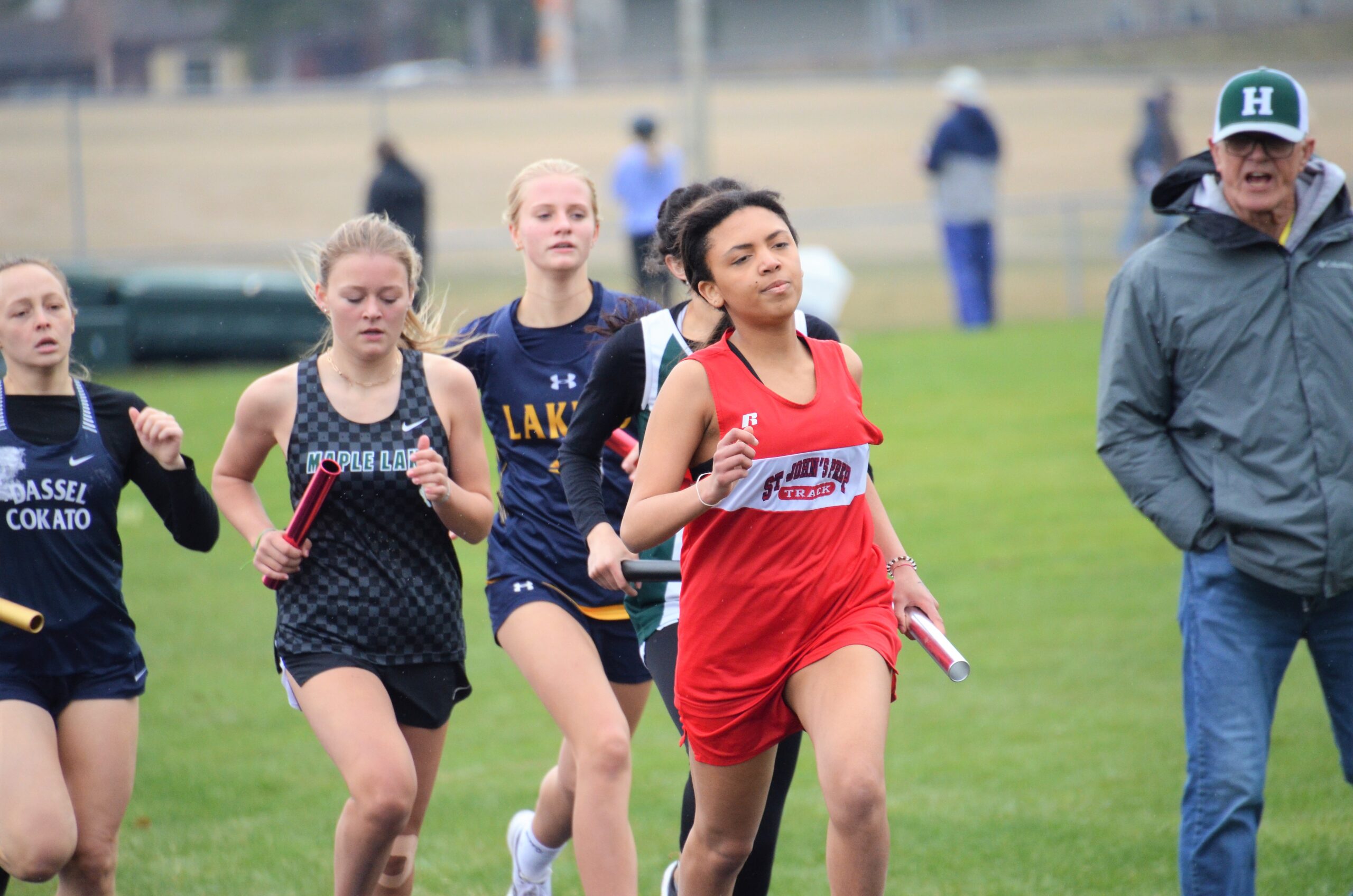Irish track teams defend title at Lions Invite | Maple Lake Messenger